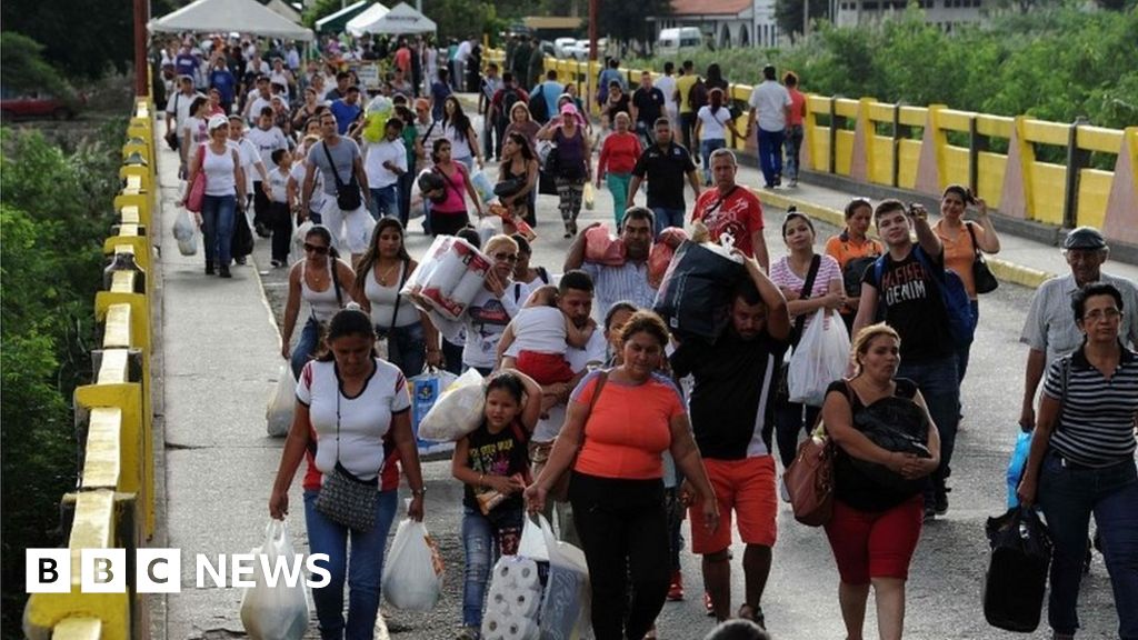 Venezuela and Colombia to partially reopen border - BBC News
