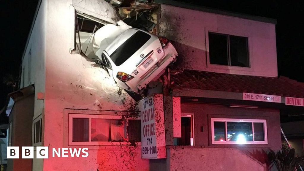 Car hurled into upper floor of California building - BBC News
