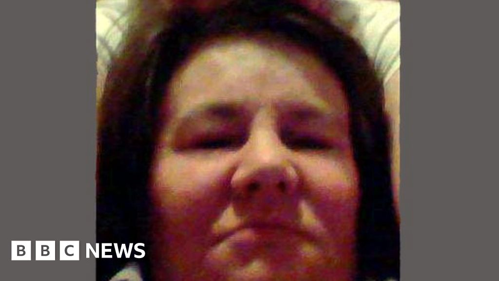 Woman may have lain dead in Troon home for months - BBC News