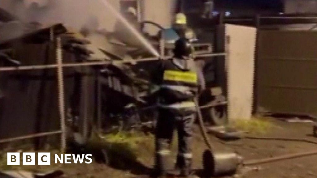 Aftermath as Russian plane crashes into house - BBC News