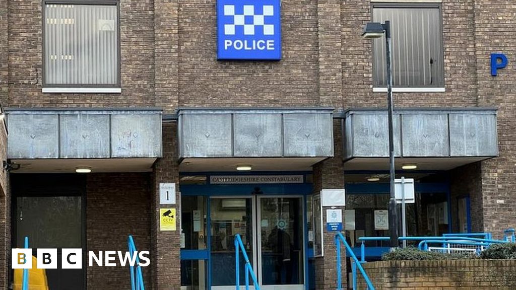 Peterborough detective in sex abuse unit jailed over images - BBC News