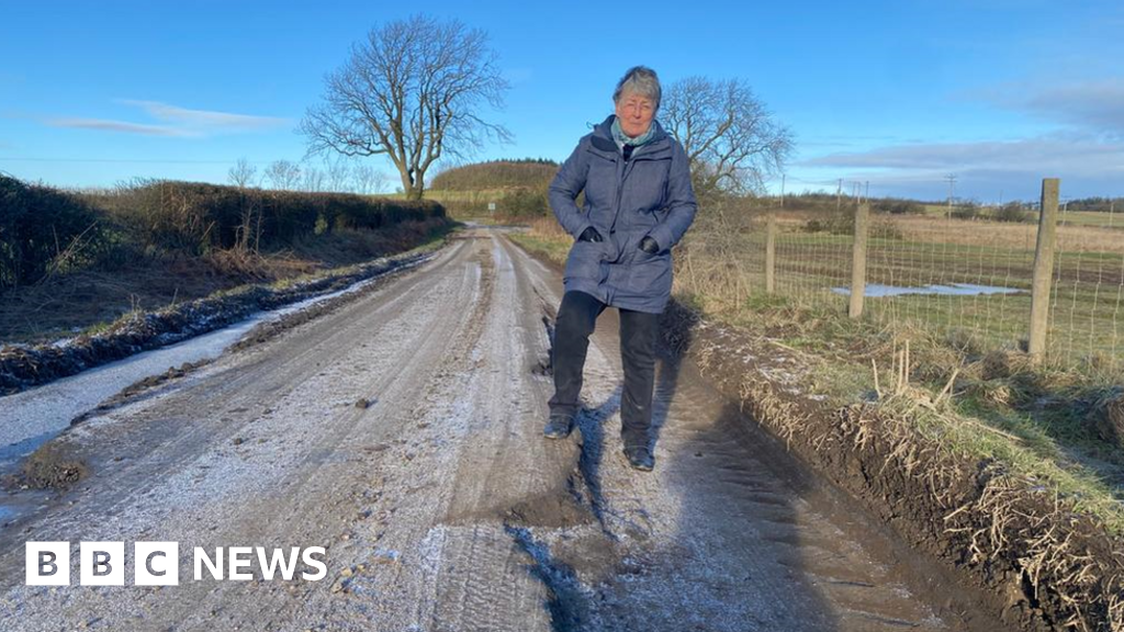 Repairs carried out on hole-stricken road in Shropshire - BBC News