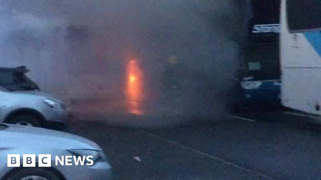 Two buses destroyed by fire in Belfast - BBC News