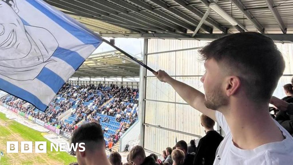 Colchester United fans react to Football League survival - BBC News