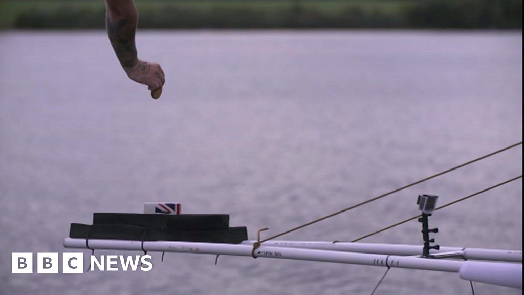 Bungee jumper dunks biscuit from 75m, setting world record - BBC News