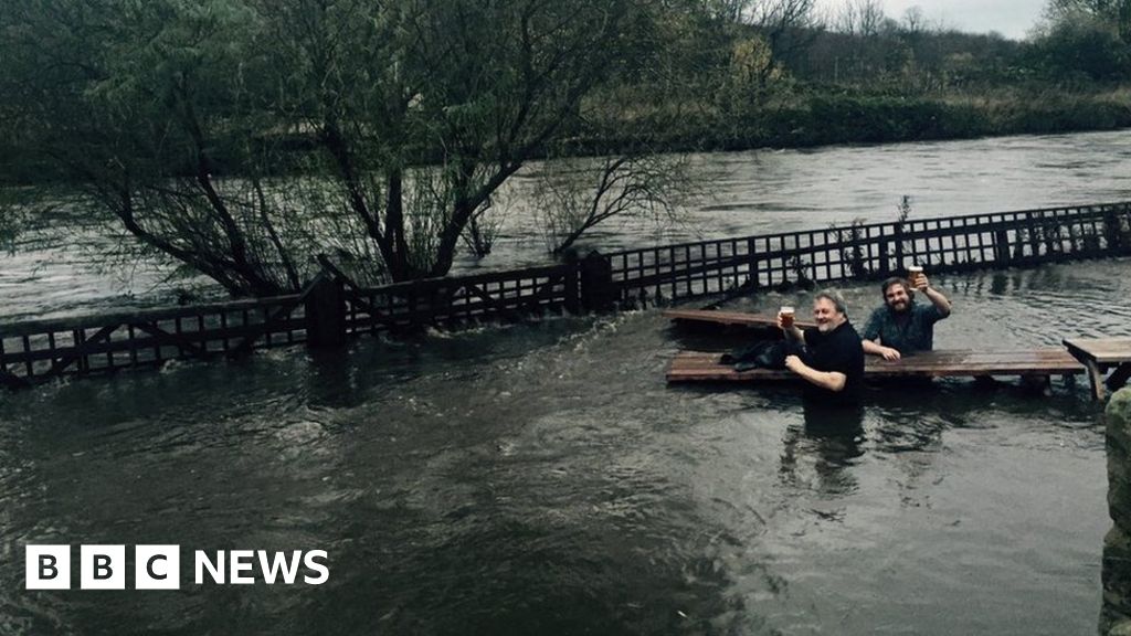 Heavy rain brings flood disruption across England - BBC News
