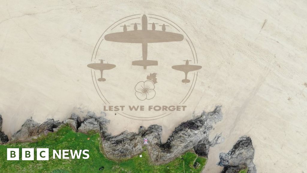 Remembrance planes sand drawing created on Cornwall beach - BBC News