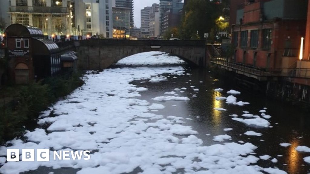 Mystery as white foam covers River Irwell in Salford - BBC News
