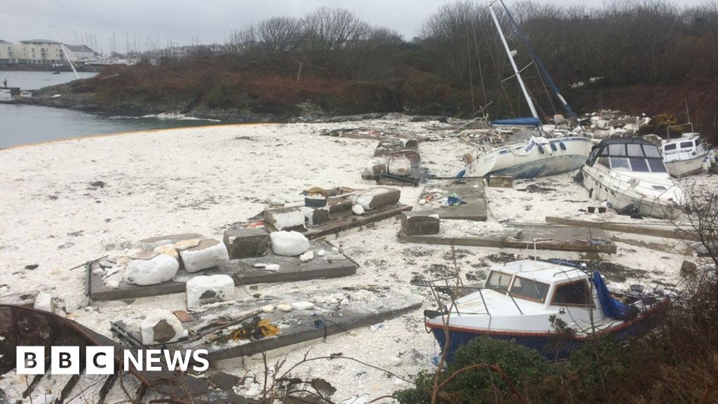 Storm Emma: Holyhead Marina filled with polystyrene - BBC News