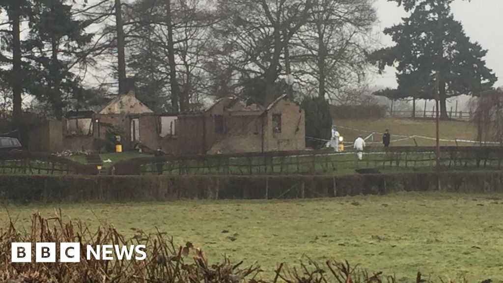 Child among three bodies found after Reigate house fire - BBC News