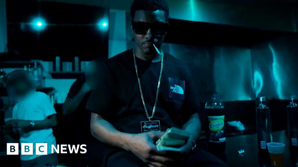 Convicted gang member bragged about wealth in music videos - BBC News