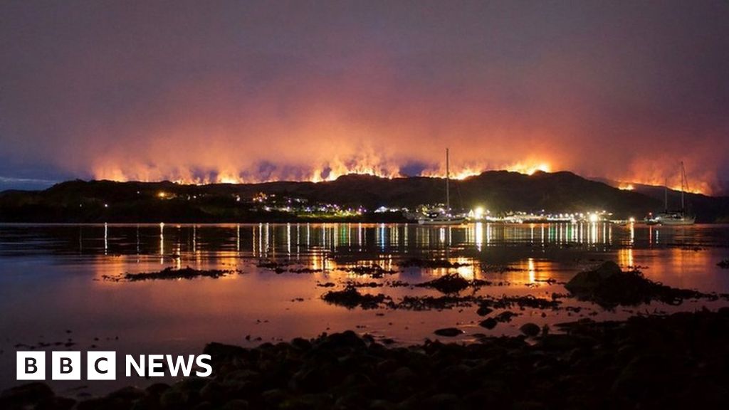 Crews battle wildfire near west Highlands village - BBC News