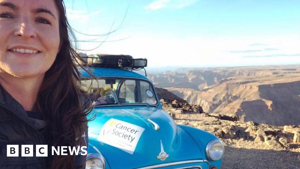 Woman finishes Aberdeen to Cape Town Morris Minor trip - BBC News