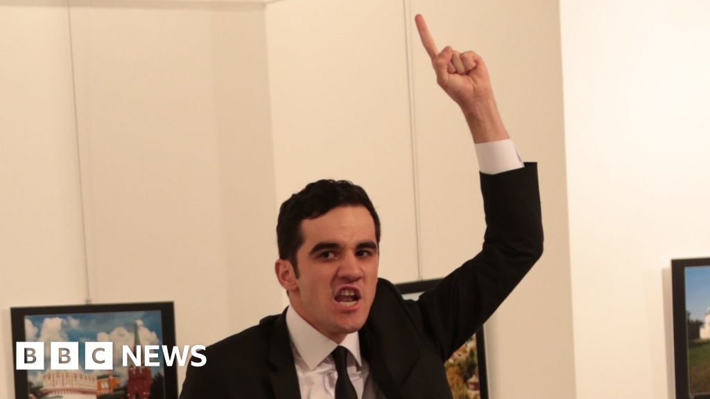 Russian ambassador killing: Photographer who captured the scene - BBC News