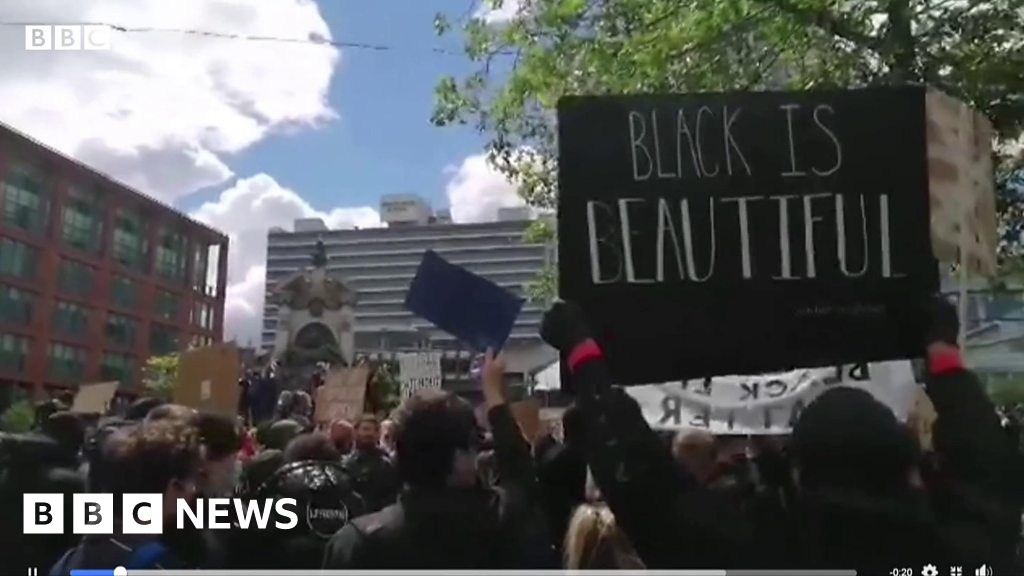 Demonstrators in support rally after Floyd death