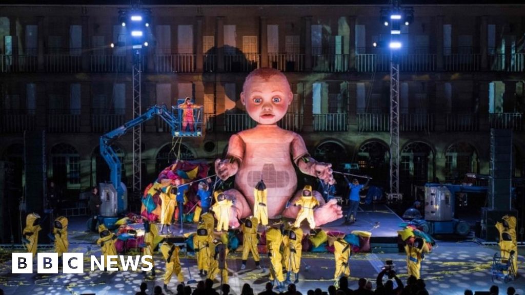 Zara: Giant baby puppet stars in Halifax Piece Hall show - BBC News