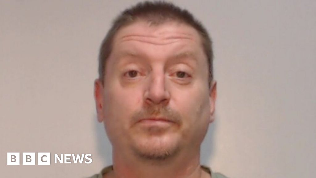 Stockport married pair who sexually abused two girls jailed - BBC News