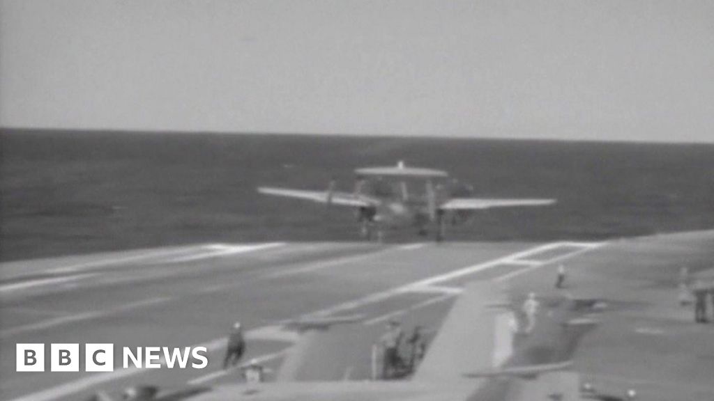 US Navy plane overshoots landing on naval carrier - BBC News