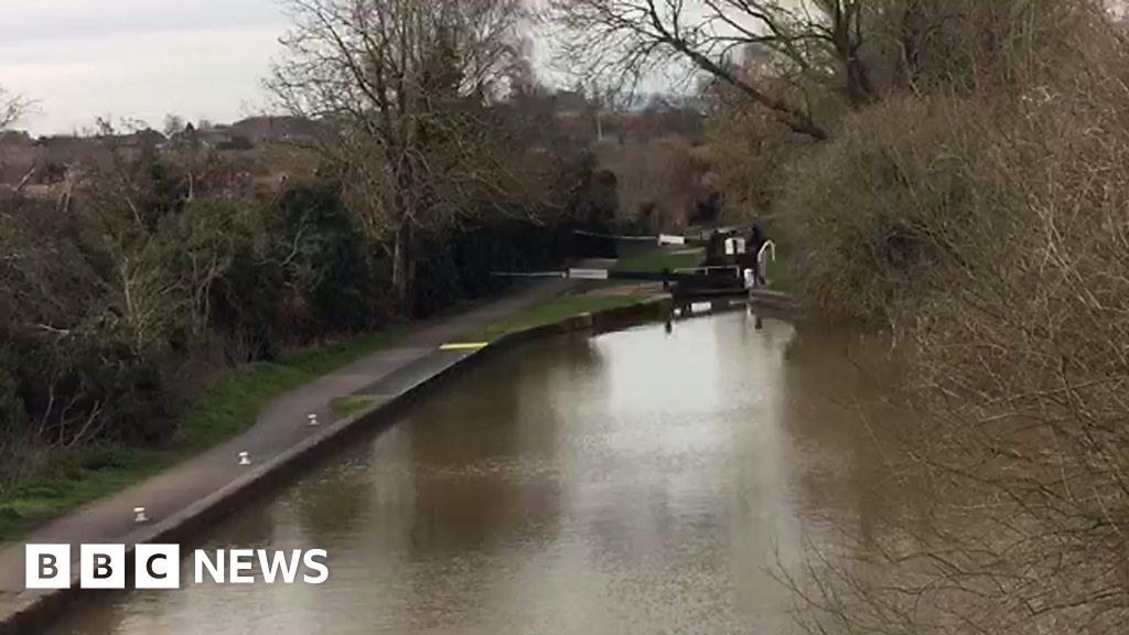 Worcester canal cordoned off after murder arrest - BBC News