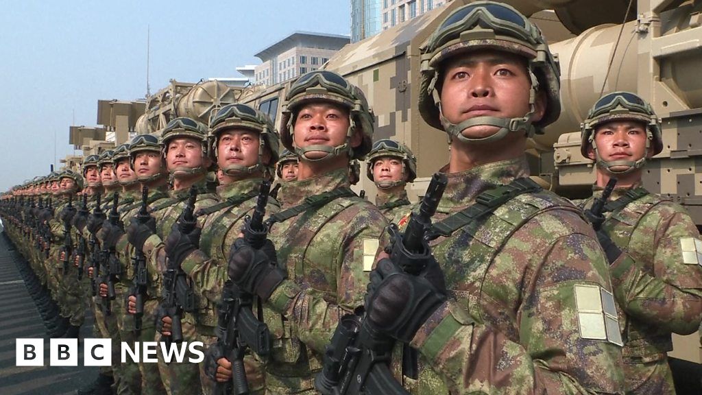 China at 70: Xi Jinping inspects troops on national day - BBC News