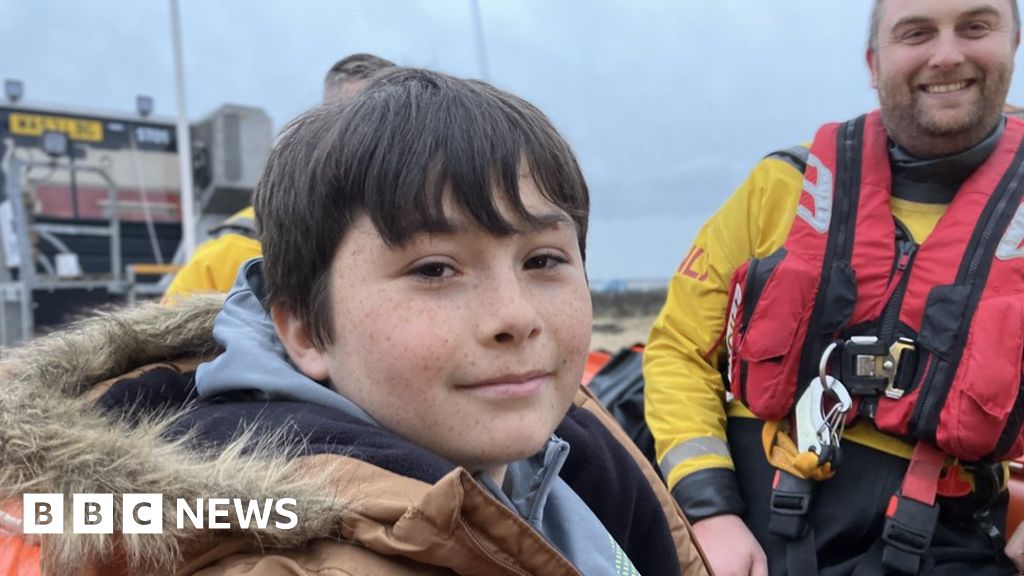 Boy reunites with RNLI volunteers who saved his life