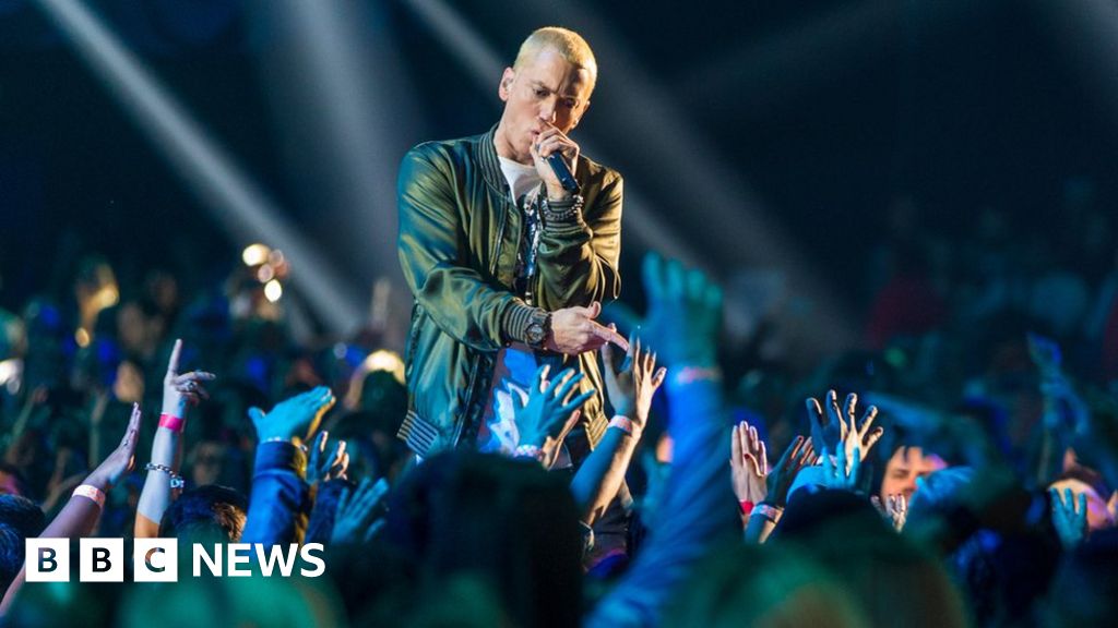 Eminem's selling off bricks and wood from his childhood home - BBC News