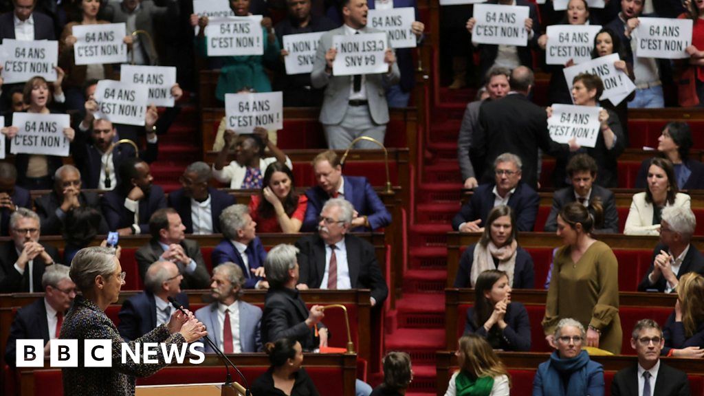 WATCH: French MPs boo PM and sing anthem over pension reform - BBC News