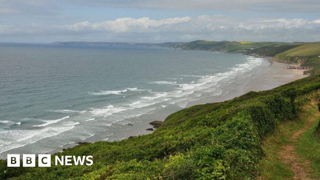 Royal Marine seriously hurt at Tregantle beach near Plymouth - BBC News