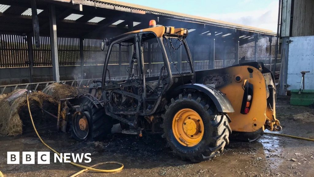 Cows rescued after JCB fire near Isle of Man farm's barn - BBC News