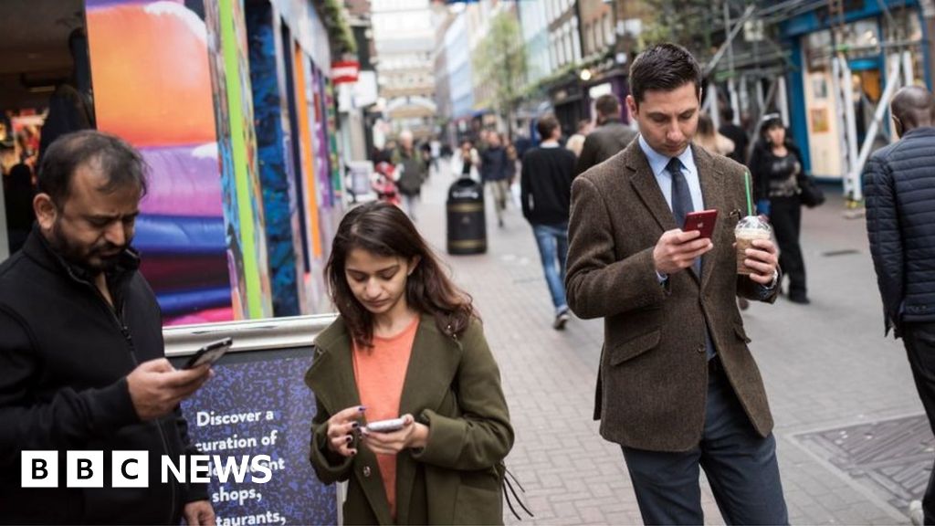 WhatsApp sues Israeli firm over phone hacking claims - BBC News