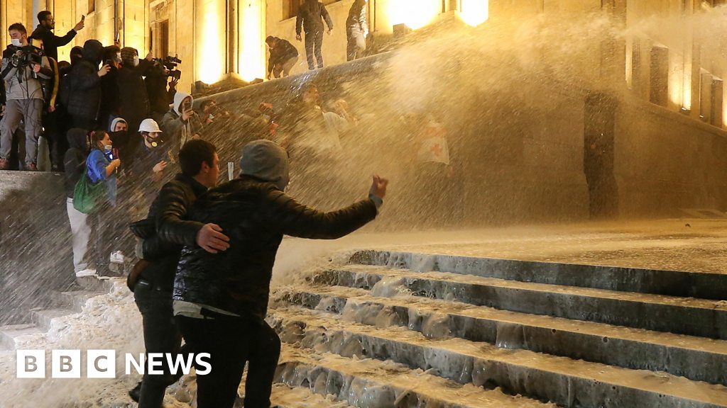 Police in Georgia fire water cannon and pepper spray at protesters ...