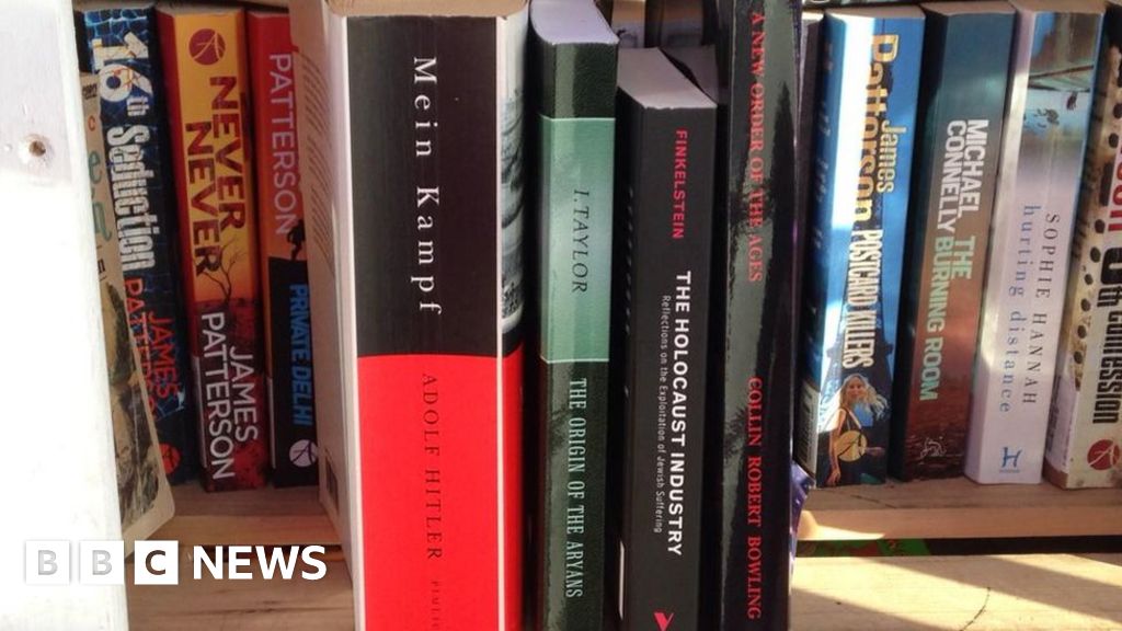Nazi books left at Norfolk village phone box 'library' - BBC News