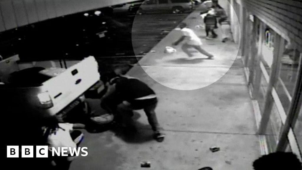 Ferguson CCTV shows shot suspect Tyrone Harris 'with gun' - BBC News