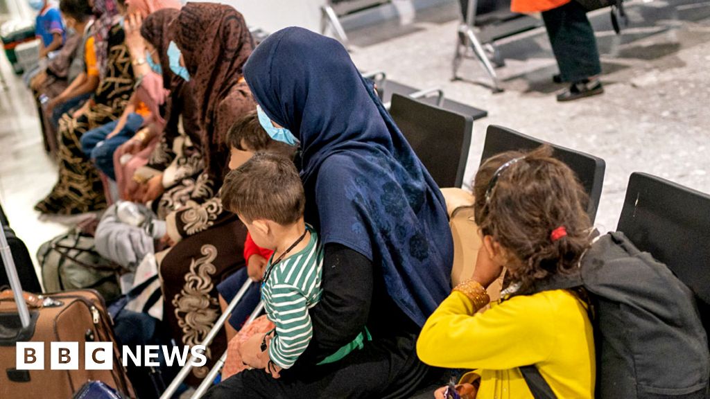 Afghanistan: Tired, overwhelmed Afghan families start new lives in the ...
