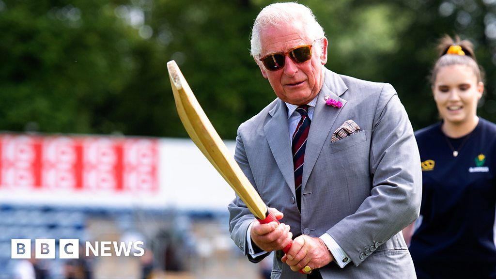 Thwack! Charles shows off his sporting skills in Wales visit - BBC News