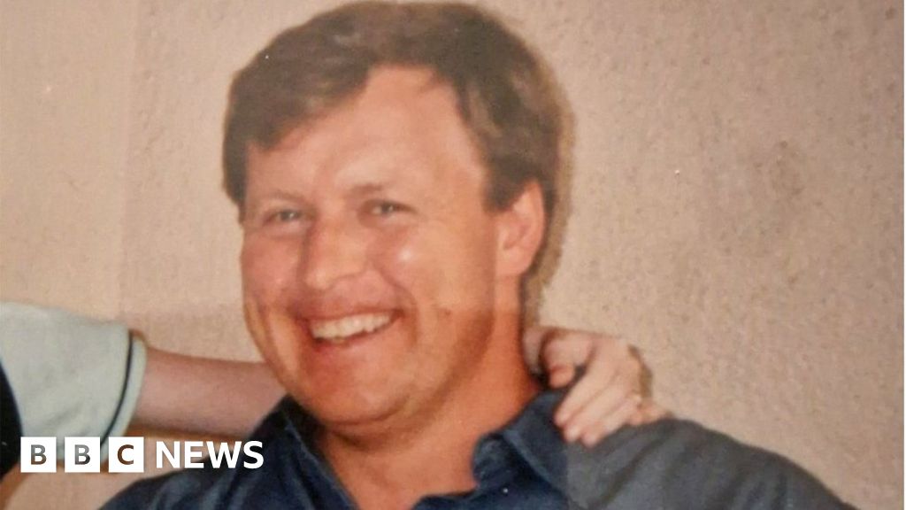 Man charged over death of 'much-loved' father - BBC News