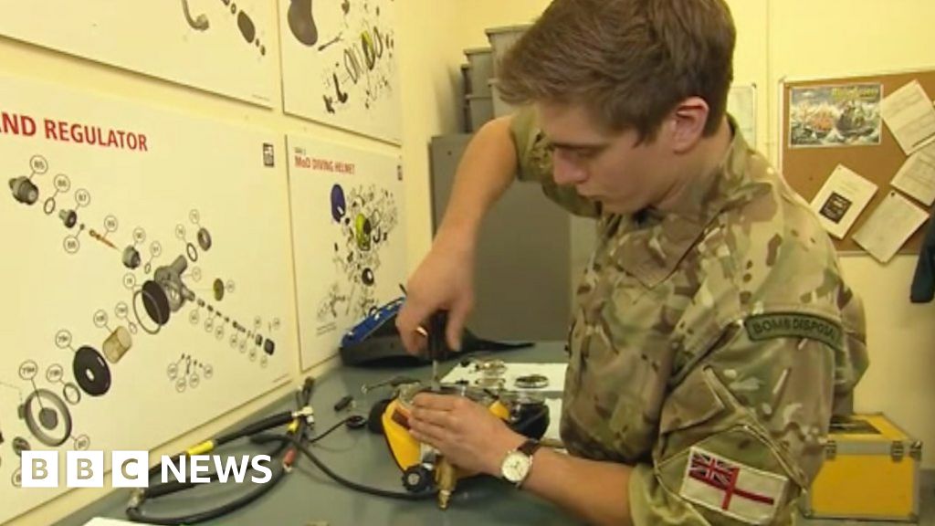 Royal Navy bomb disposal expert defuses German bombs