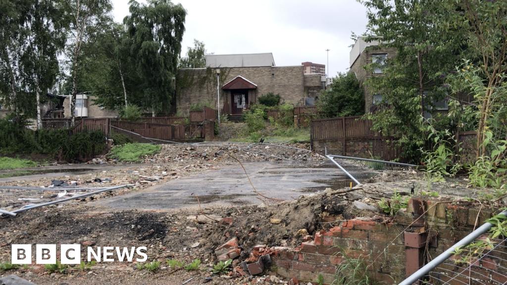 Clasper Village demolition resumes as final resident leaves - BBC News