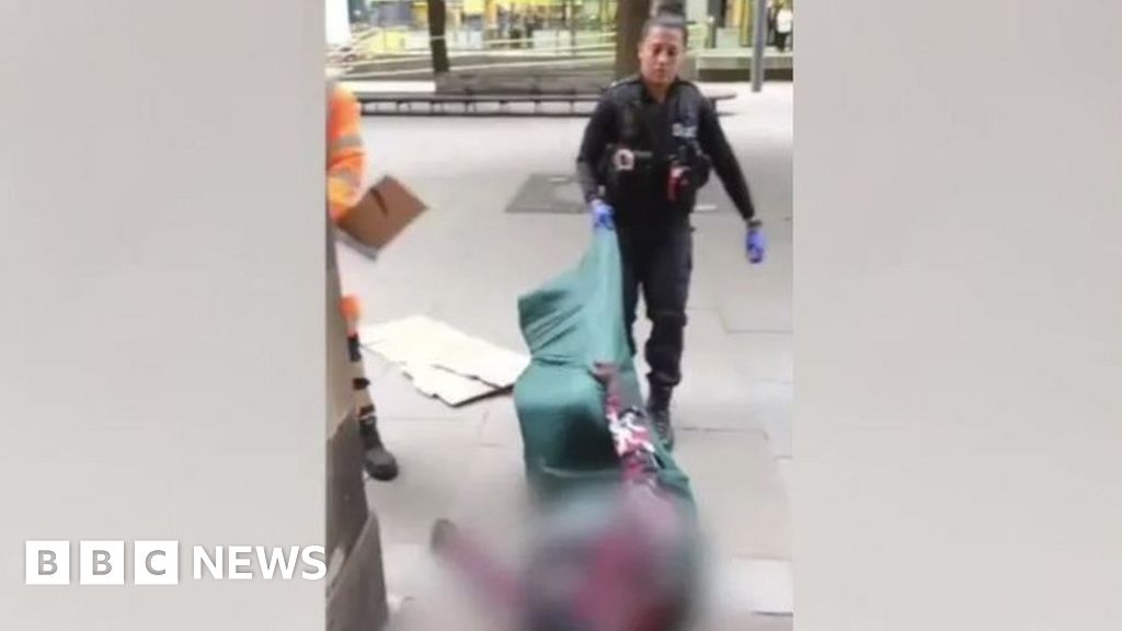 Greater Manchester Police officer drags homeless man along ground