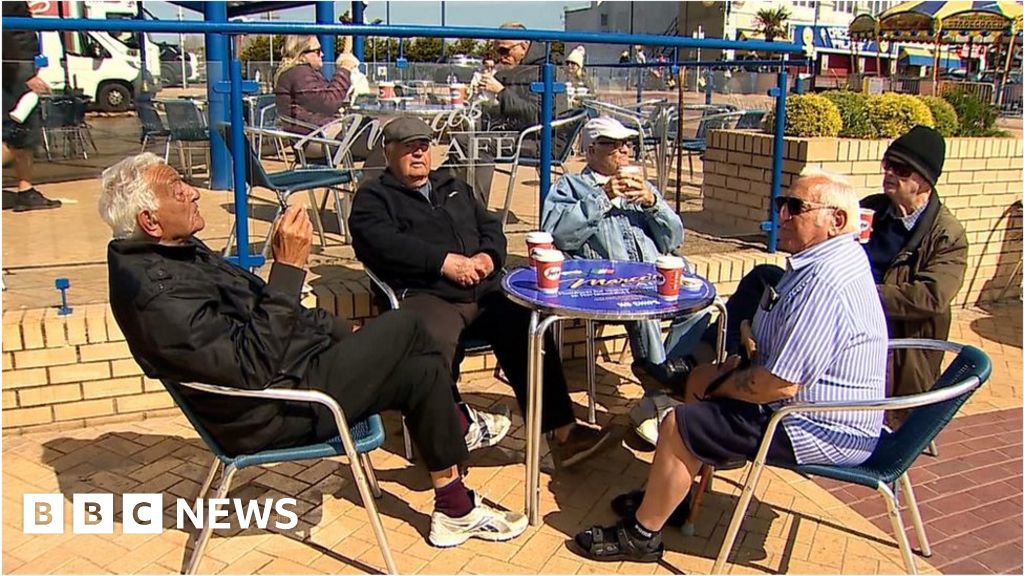 Pubs and cafes reopen: 'First drink of the year' - BBC News