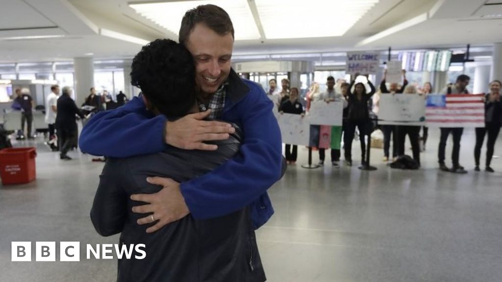 US Army officer brings Afghan interpreter to live with him - BBC News