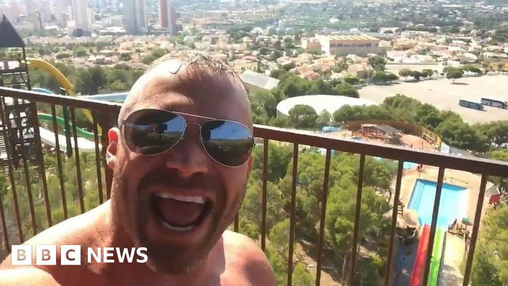 Bodybuilder 'scared of heights' on Verti-Go waterslide - BBC News