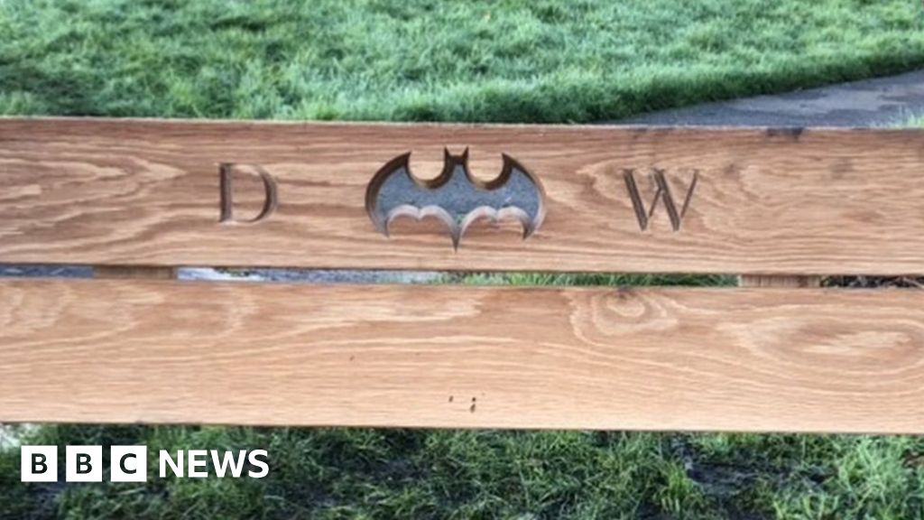 Godalming Batman park bench mystery finally explained - BBC News