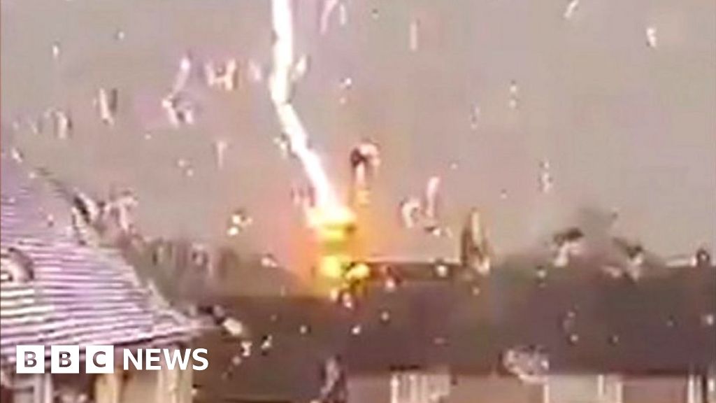 Wales weather: Moment lightning strikes house filmed by neighbour - BBC ...