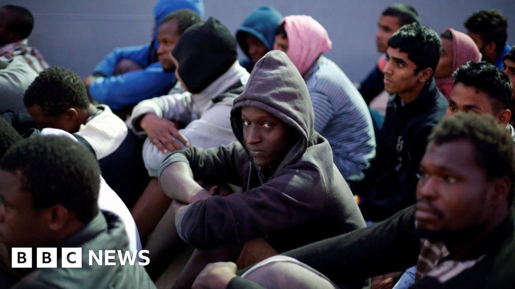 Libya migrants: Smuggling network arrest warrants issued - BBC News