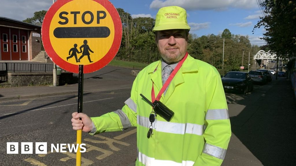 Crumlin school principal steps in as a lollipop man - BBC News