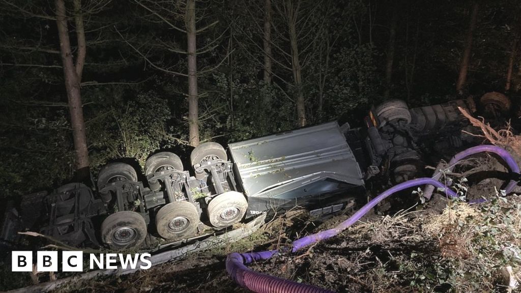 M11 crash: Car struck by lorry after being involved in crash - BBC News