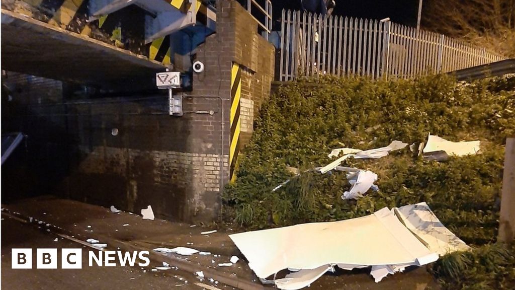 Ely railway bridge hit by van whose back is ripped off - BBC News