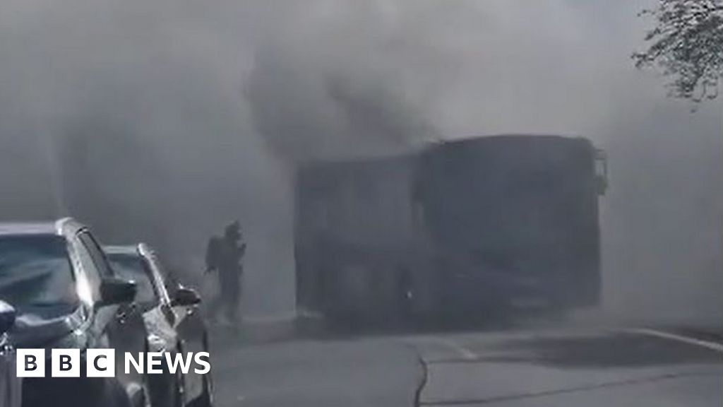 Firefighters tackle blaze on Beeston bus in Regent Street - BBC News