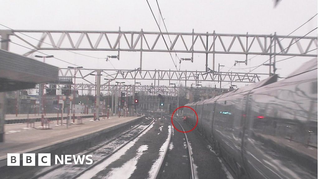 Train driver three seconds from being hit by train - BBC News